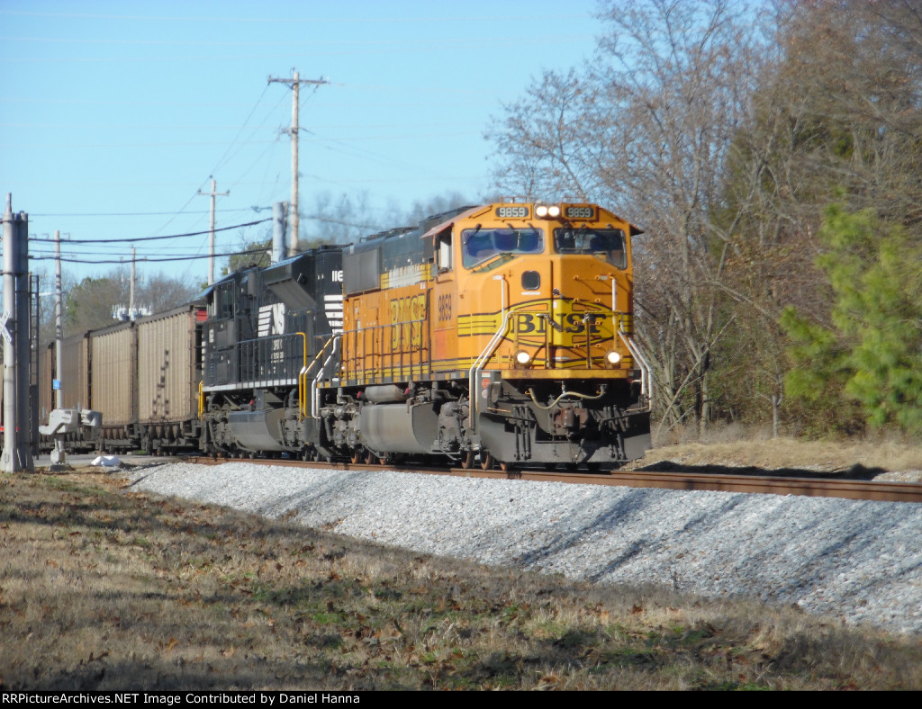 BNSF 9859 leads NS 734 east